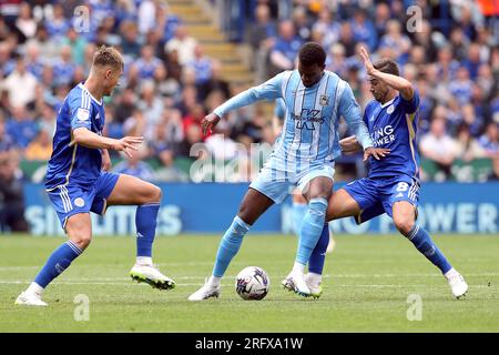 Coventry City's Haji Wright and Leicester City's Caleb Okoli (on bottom ...