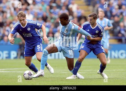 Coventry City's Haji Wright and Leicester City's Caleb Okoli (on bottom ...