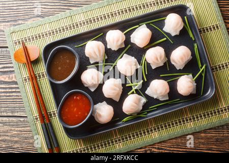 Har gow is a traditional Cantonese dumpling stuffed with shrimp closeup ...
