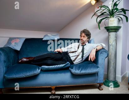 Willy Russell,relaxing at his office, Liverpool, 1988 Stock Photo - Alamy