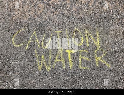 CAUTION text written on yellow-black grungy lines stamp sign Stock ...