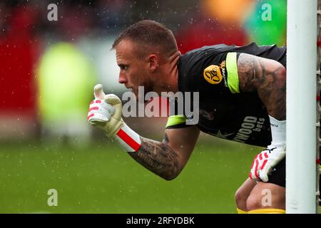 Mark Flekken of Brentford in action during the Premier League match between Brentford and ...