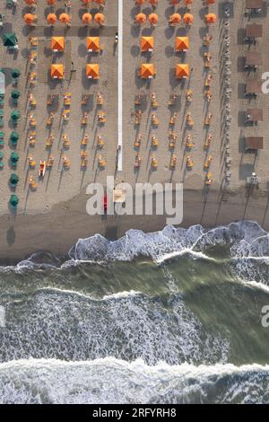 Aerial view of Versilia beach with rough sea photographed from above ...