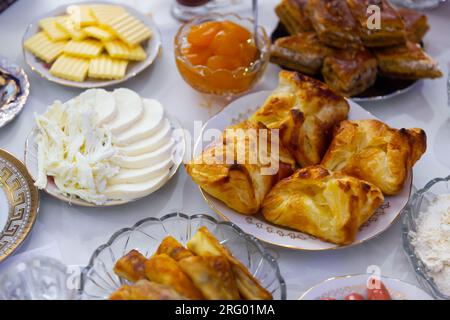 Breakfast in georgian hotel with fried eggs, cheese, vegetables Stock ...
