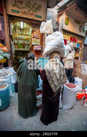 Africa, Egypt, Cairo. Tourists and locals visit the famous Khan el ...