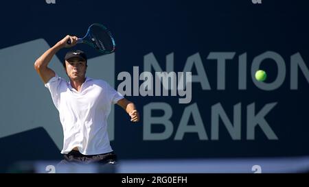 Dane Sweeny of Australia plays a forehand return to Francisco Cerundolo ...