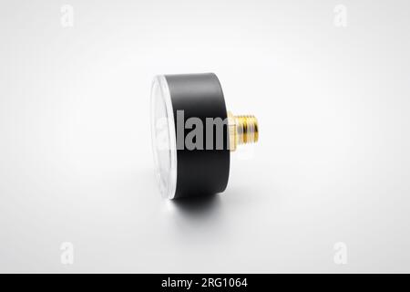 Small pressure gauge. Close-up. On white background Stock Photo - Alamy
