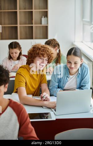 students with laptop and notebooks at school Stock Photo - Alamy
