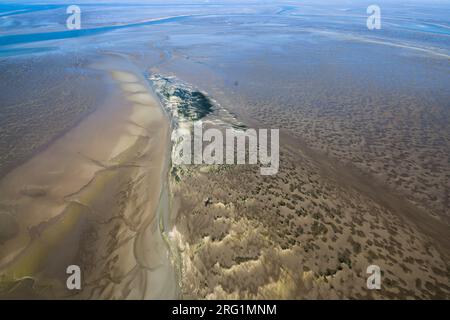 View from a plane. Tidal creeks and mudflats at the Germany Wadden Sea ...