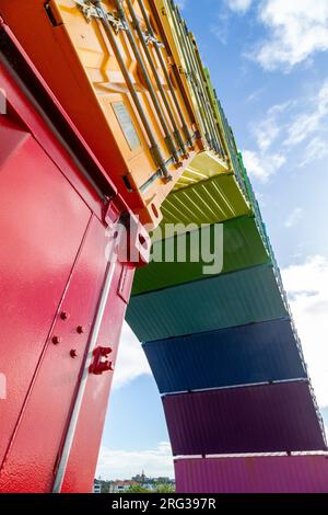 Rainbow shipping container sculpture by Marcus Canning on beach reserve ...