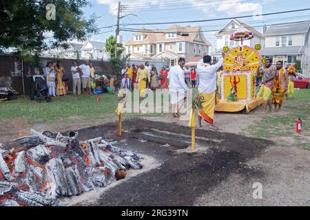 Prior to the Hindu ritual of Thimithee fire walking, devotees march ...