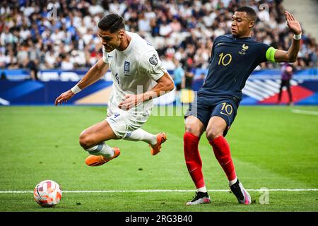 Konstantinos MAVROPANOS of Greece and Kylian MBAPPE of France during ...