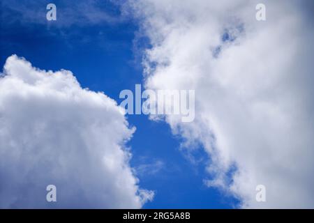 Stratus cumulus alto nimbo clouds in the blue sky are weather ...