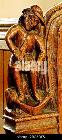 Medieval bench end, Anger, Seven Deadly Sins, angry man with knife in ...