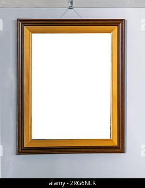 Old wooden picture frame hanging on a rope Stock Photo - Alamy