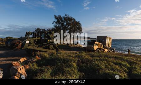 United States Army machinery successfully lands on the beach from a ...