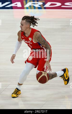 Puerto Rico forward Isaiah Pineiro (0) and Jordan Howard (3) react ...