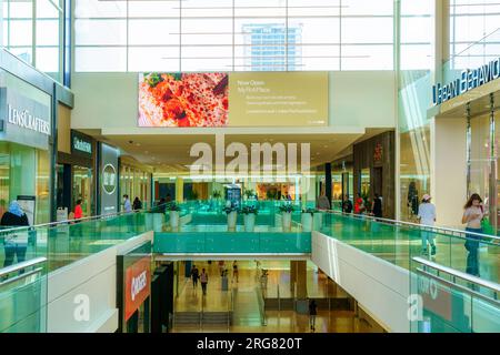 Mississauga, Canada, People at the entrance. Symmetry of escalators and ...