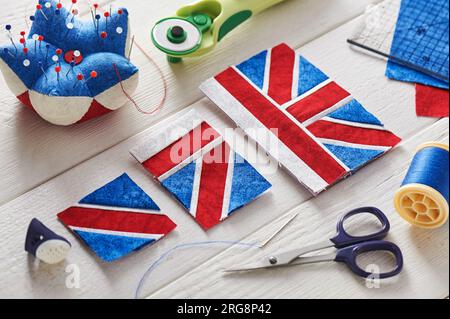 Parts of future pincushion viewing like union jack flag, sewing ...