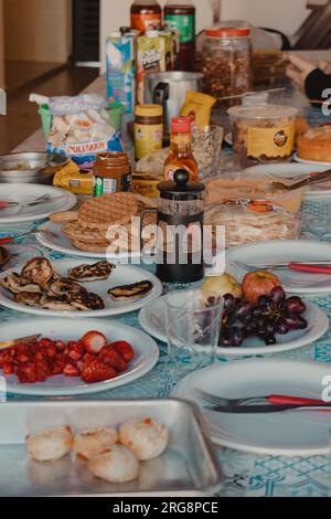 Healthy and various morning breakfast selection: olives, cereals, ham ...