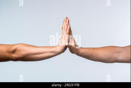 Two hands gestures. Giving high five. Two hands, male and man. High ...