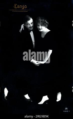 A stylish finely-dressed German couple dancing the Tango Stock Photo ...