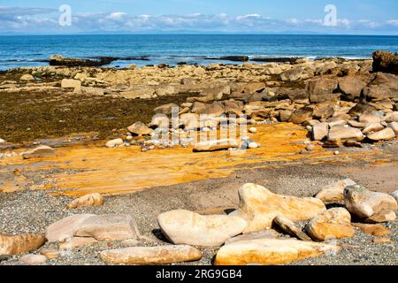 Hopeman Beaches rocks consisting of Hopeman Sandstone (Permo-Triassic ...