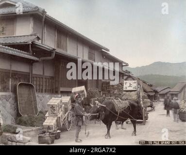 [ 1890s Japan - Japanese Ox cart with Rice Bags ] — A man stands next ...