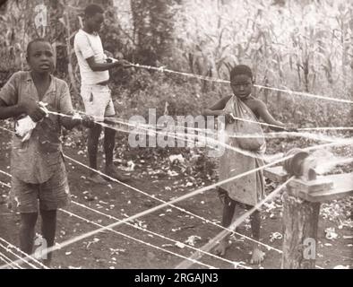 1940s East Africa - Uganda - making a dugout canoe, Butiaba, Lake ...
