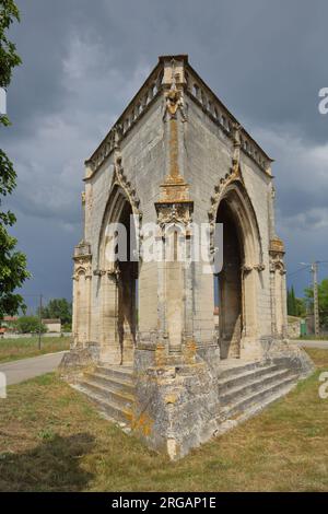Triangular historical monument Croix Couverte built 14th century ...