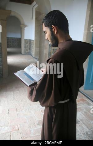 Catholic monks pray at San Francisco Church during a Mass in memory of ...