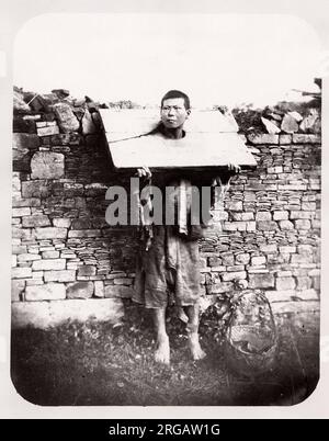 Late 19th century photograph - Man in a Cangue, stocks, punishment ...