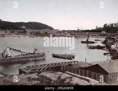 Late 19th century photograph - waterfront view Hong Kong, boats tied up ...