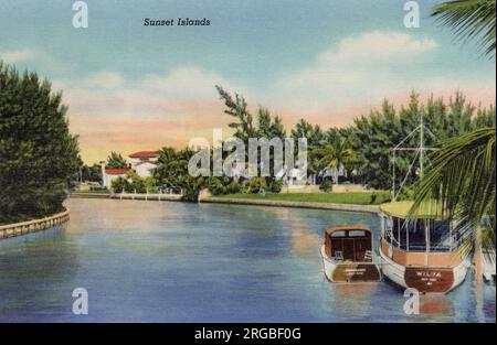 Tropical islands at sunset Stock Photo - Alamy