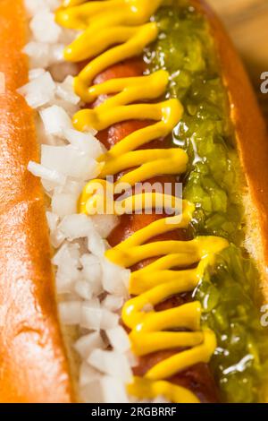 Char Grilled Hot Dog with Mustard Relish and Onion Stock Photo - Alamy