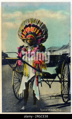 A Rickshaw boy of Durban in their remarkable costume. Introduced from ...
