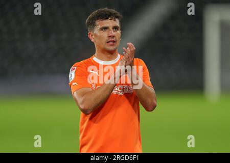 Albie Morgan #8 of Blackpool applauds the travelling fans after the ...