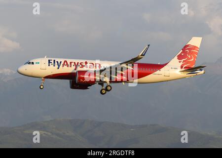 FlyArystan Airbus A320neo airplane about to land in Almaty Airport in ...