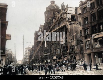 Bomb damage London during WW2 rubble and debris lay in the street the ...