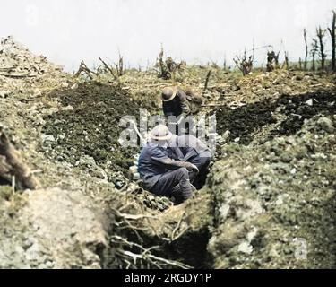 British soldiers digging a communication trench through what was once ...
