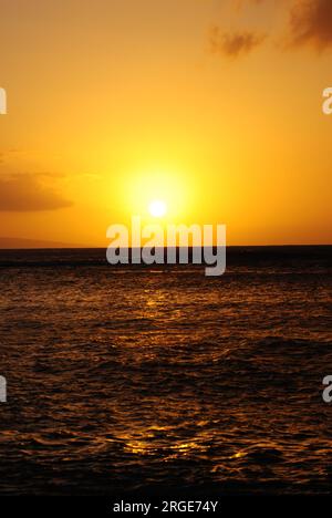 Melting Sun - Maui Sunset Stock Photo - Alamy
