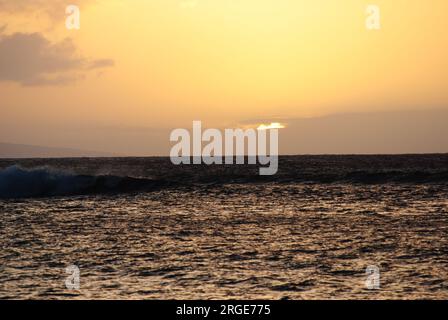 Melting Sun - Maui Sunset Stock Photo - Alamy