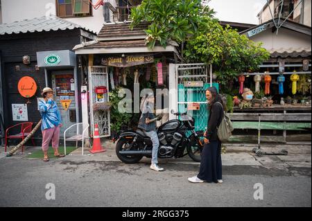 Thai biker smoking weed in Chiang Mai Stock Photo - Alamy