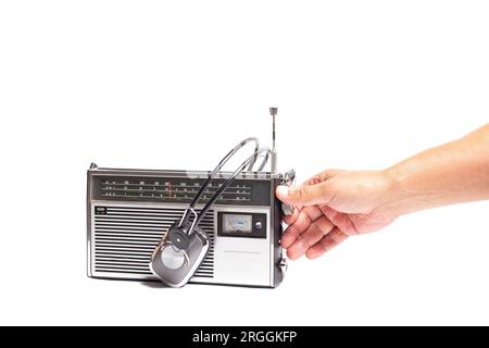 Hand tuning radio receiver button Stock Photo - Alamy