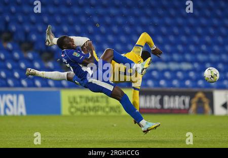 Colchester United's Samson Tovide clashes with Cardiff City's Jamilu ...