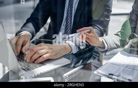 research reports growth using pc computer looking at screen analyzing ...