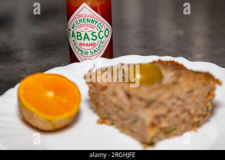 Typical kibbeh baked in the oven. Tabasco chili sauce Stock Photo - Alamy