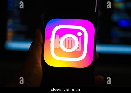 In this photo illustration, a woman uses Instagram on her smartphone ...