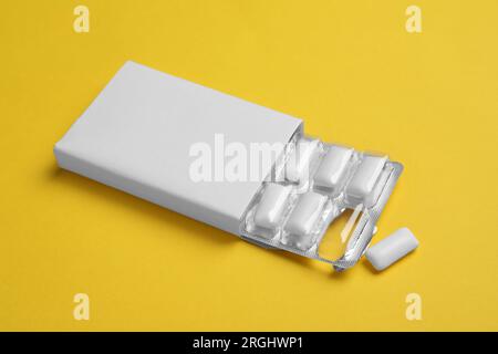 Pack with tasty chewing gums on bright pink background, top view Stock ...