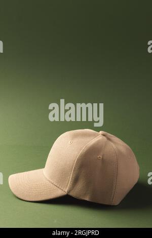 Cream baseball cap and copy space on blue background Stock Photo - Alamy
